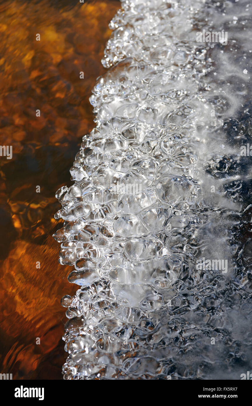 Spring melting of ice and the flow of water Stock Photo - Alamy