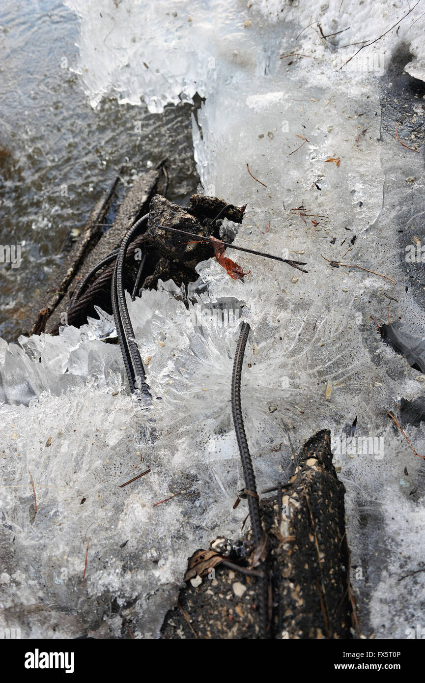 Pieces of iron rebar sticking out of the melted people Stock Photo - Alamy