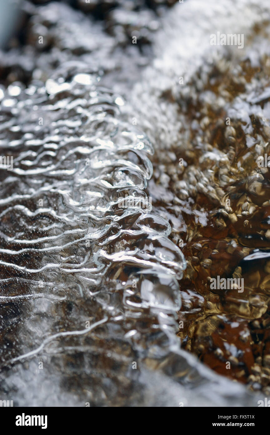Close up of melting ice in spring Stock Photo - Alamy