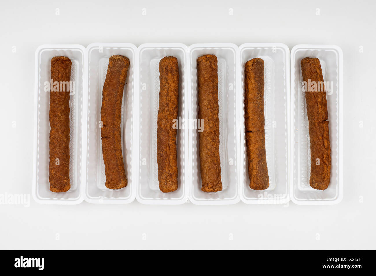 Six fried fricandel in a white plastic container Stock Photo - Alamy