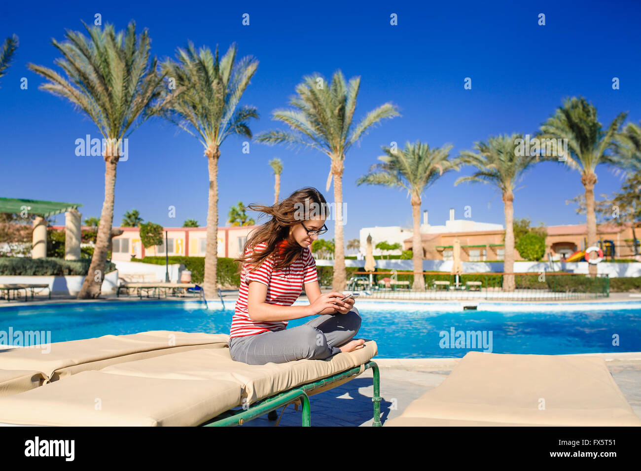 Beautiful girl relaxing in chair hi-res stock photography and images ...