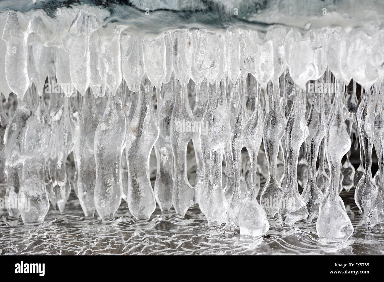 Close up of melting ice in spring Stock Photo - Alamy