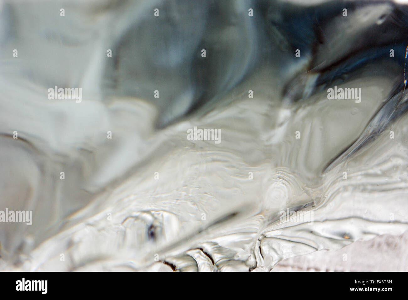 Close up of melting ice in spring Stock Photo - Alamy