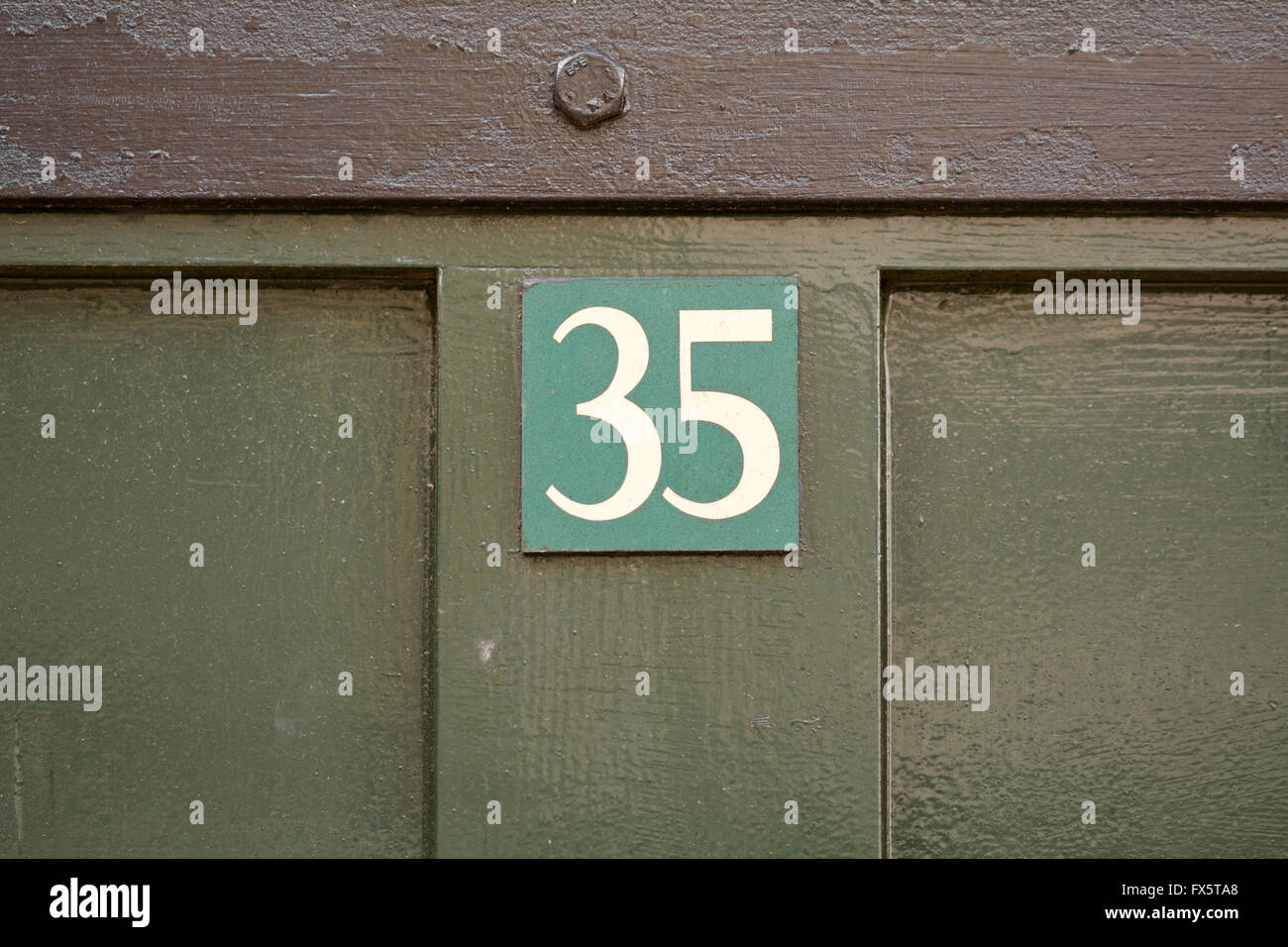 House number 35 sign on door Stock Photo - Alamy