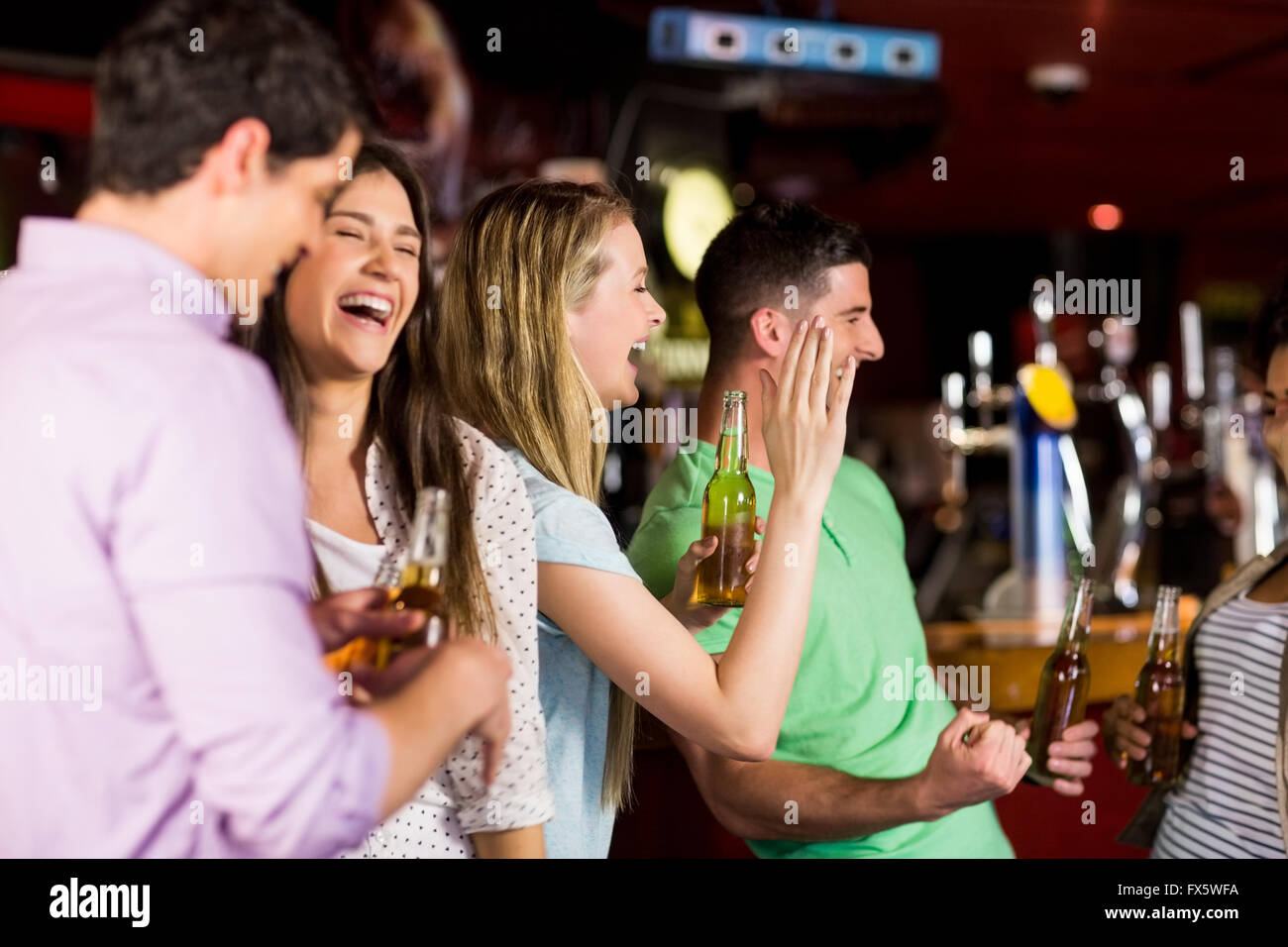 Smiling friends having fun Stock Photo - Alamy