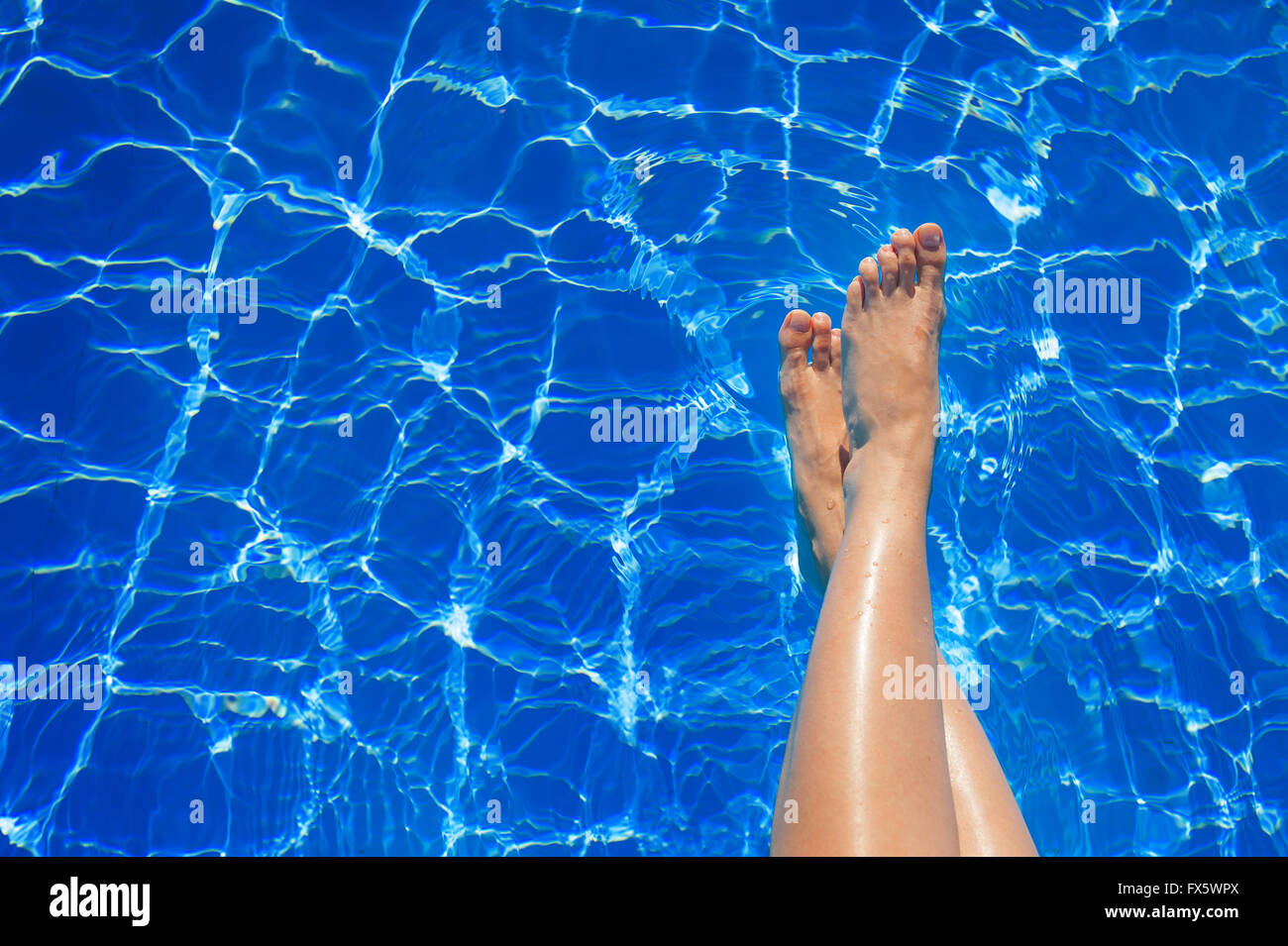 Person swimming in pool blue hi-res stock photography and images - Alamy