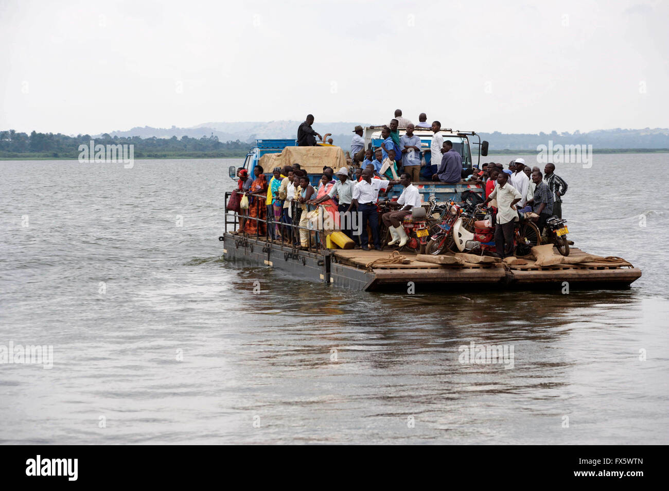 Ferry boat crossing with passengers on Lake Victoria in Uganda, Africa ...