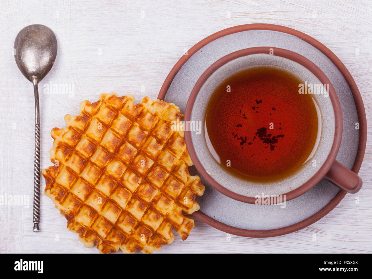 Cup of tea and a wafer top view closeup background Stock Photo - Alamy