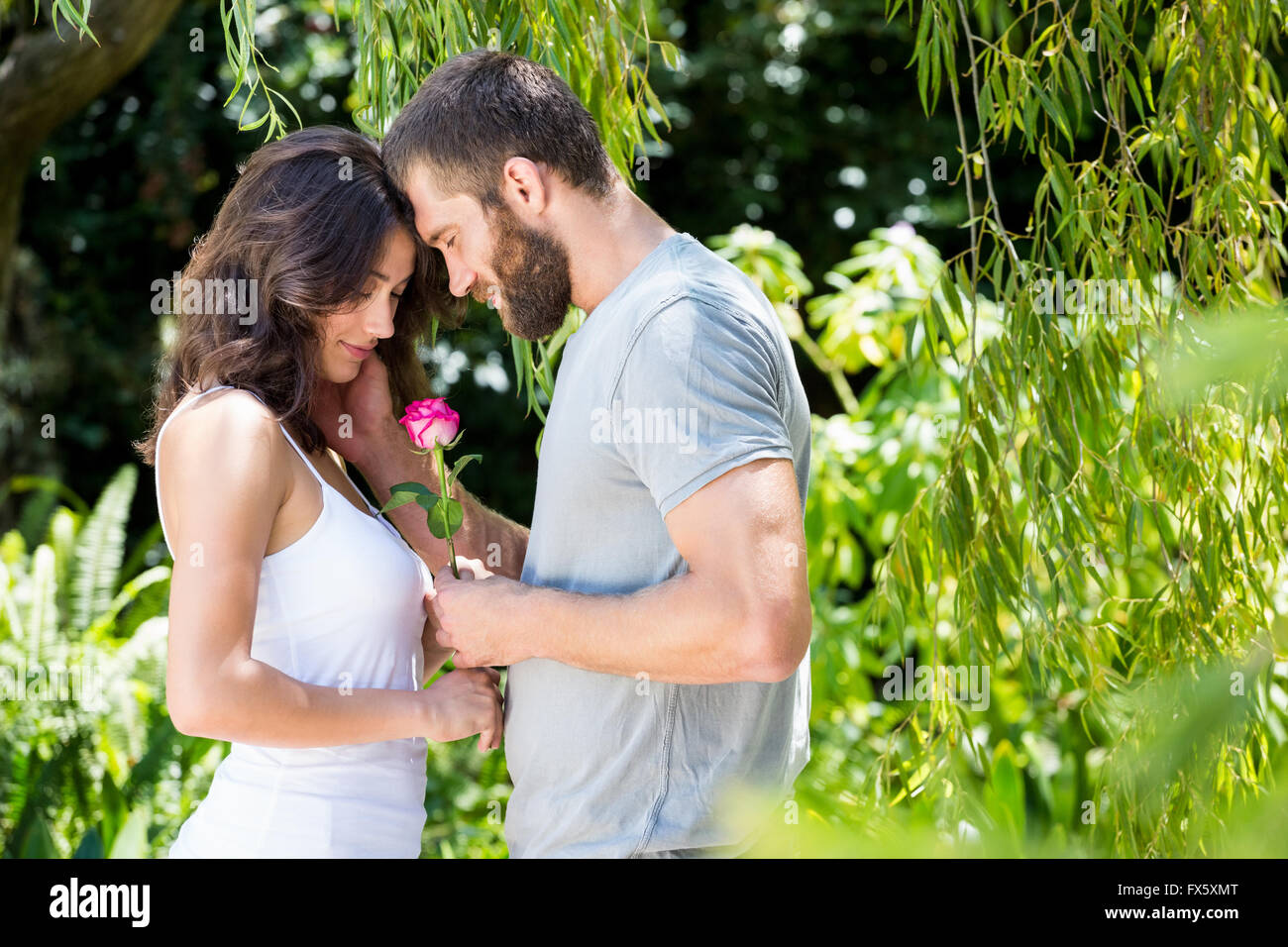 Couple rose garden offering hi-res stock photography and images - Alamy