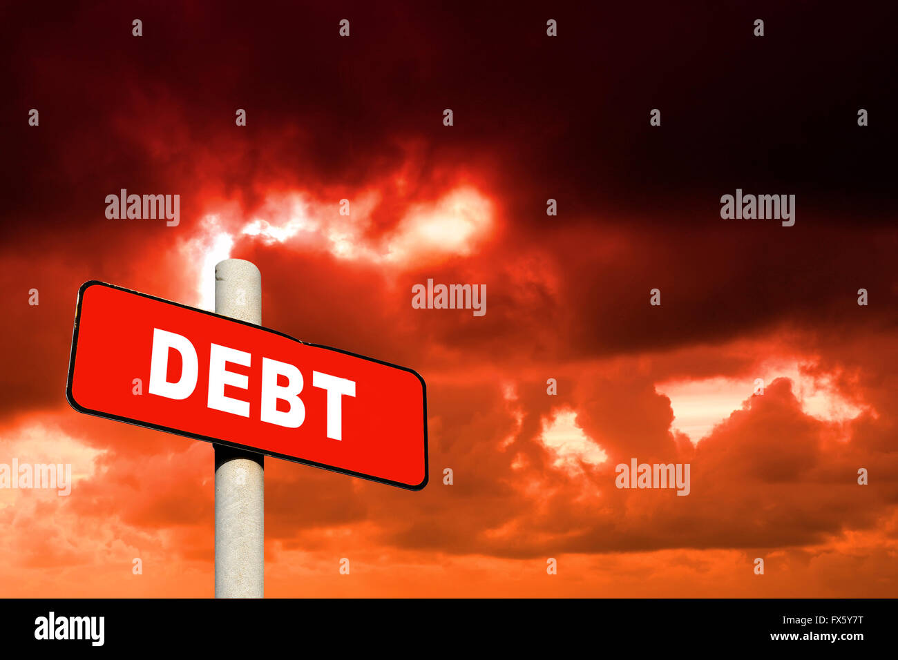 Red debt sign against a red sky Stock Photo - Alamy