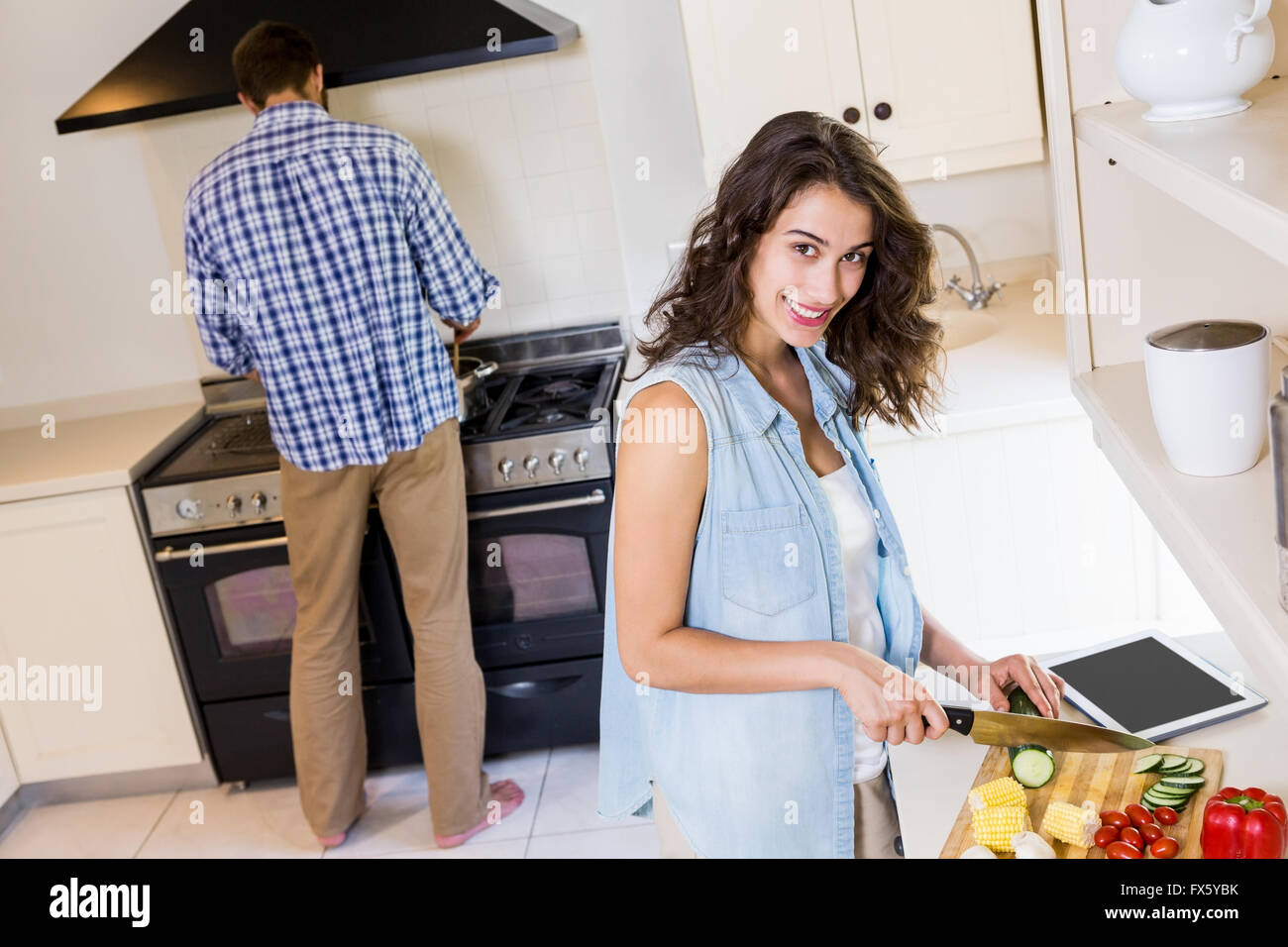Man cooking at stove hi-res stock photography and images - Alamy