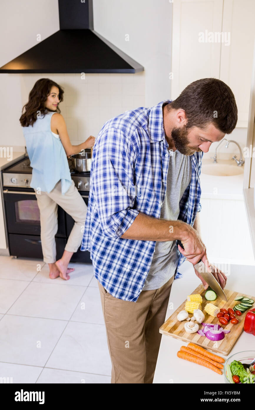 Woman cooking at stove hi-res stock photography and images - Alamy