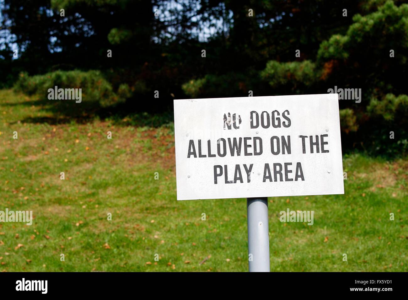 No dogs allowed on the play area sign Stock Photo - Alamy