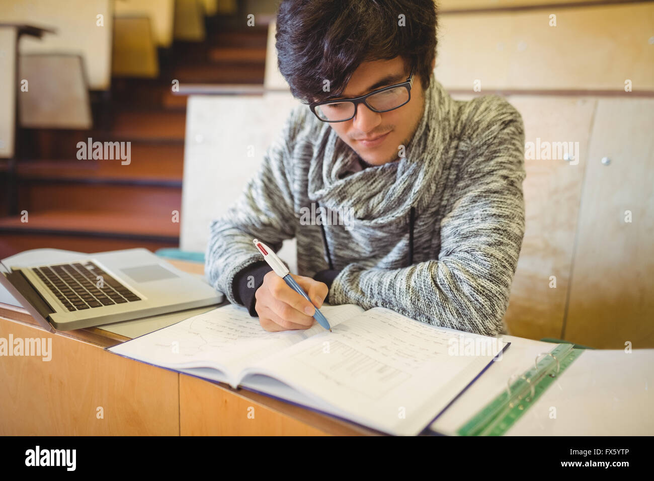 Male student sitting making hi-res stock photography and images - Alamy
