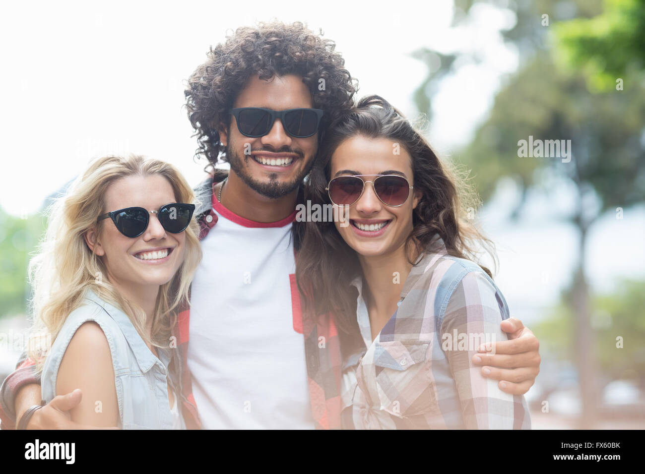 Friends posing at camera Stock Photo - Alamy