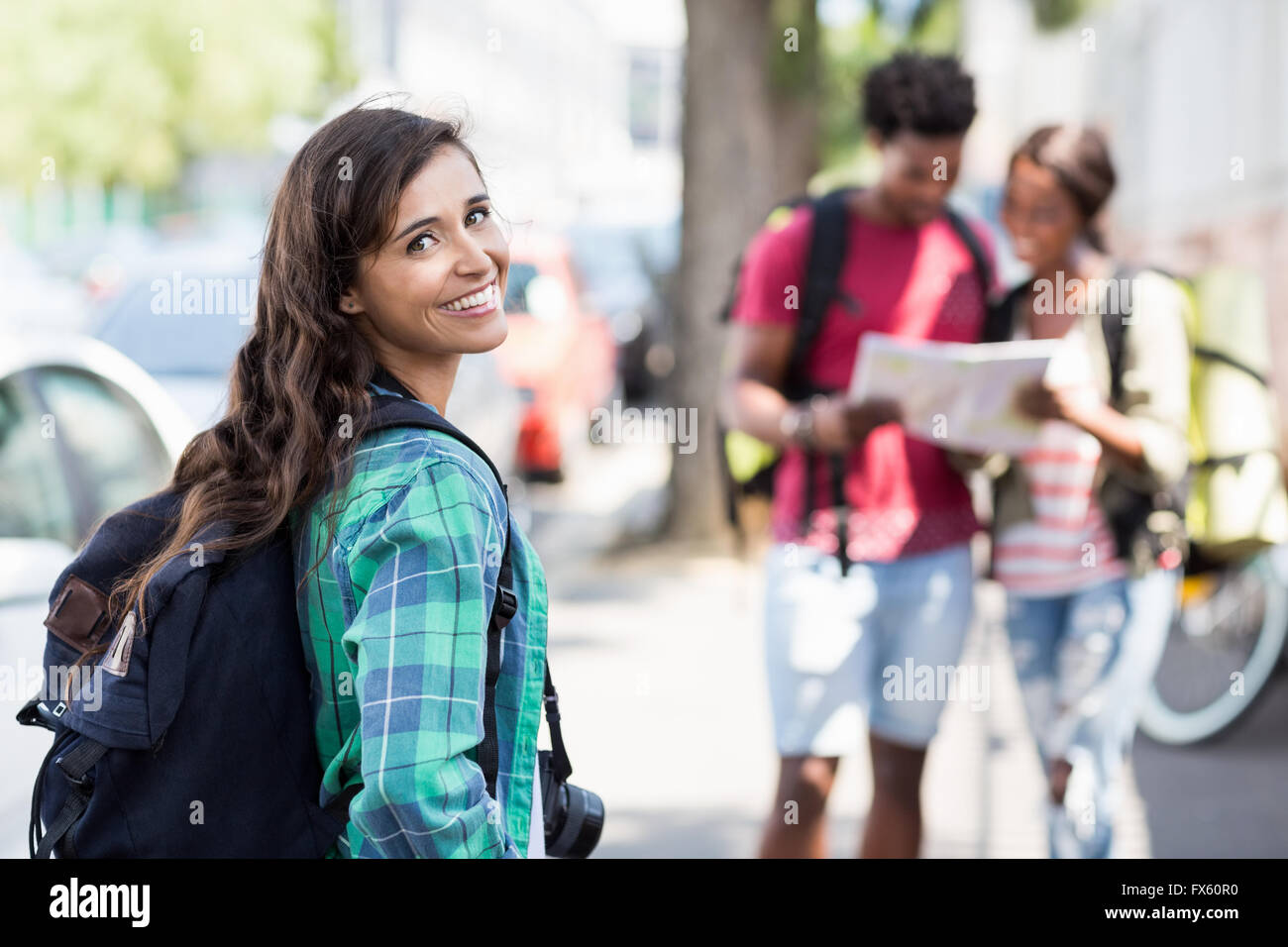 Smiling beautiful female tourist camera hi-res stock photography and ...