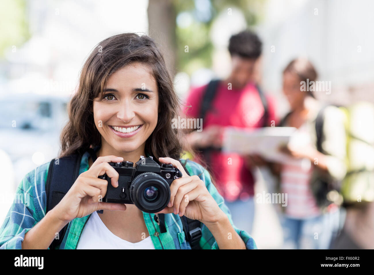 Portrait of young woman smiling Stock Photo - Alamy