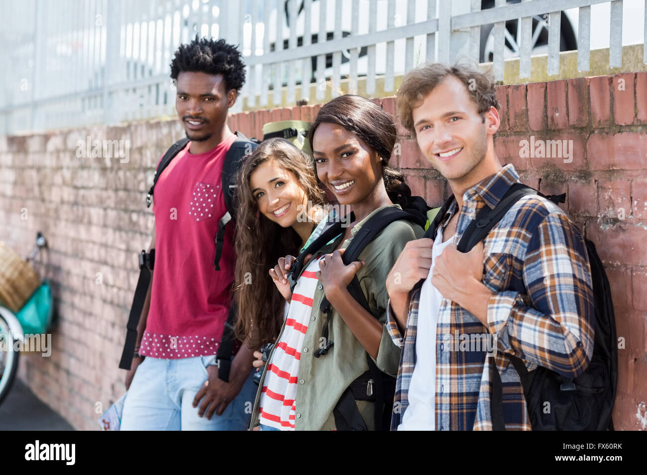 Portrait of happy friends standing together Stock Photo - Alamy