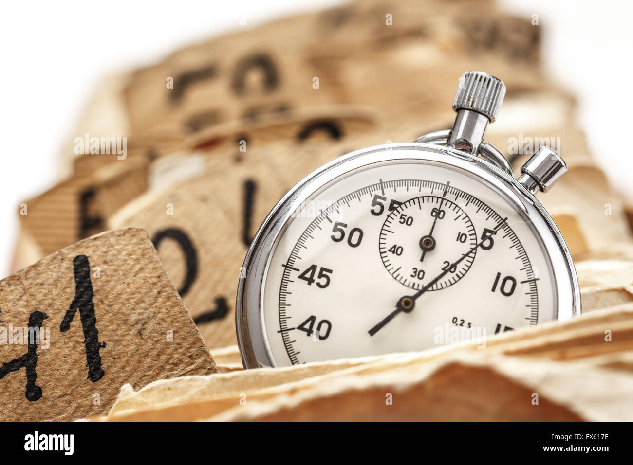 Archive file folders in drawer with stopwatch Stock Photo - Alamy