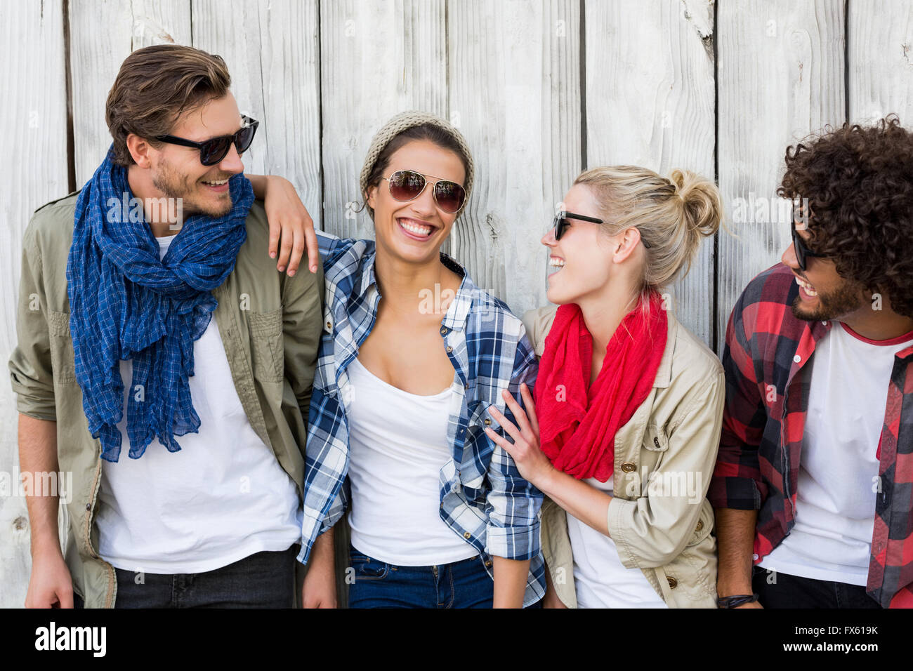 Friends interacting with each other Stock Photo - Alamy
