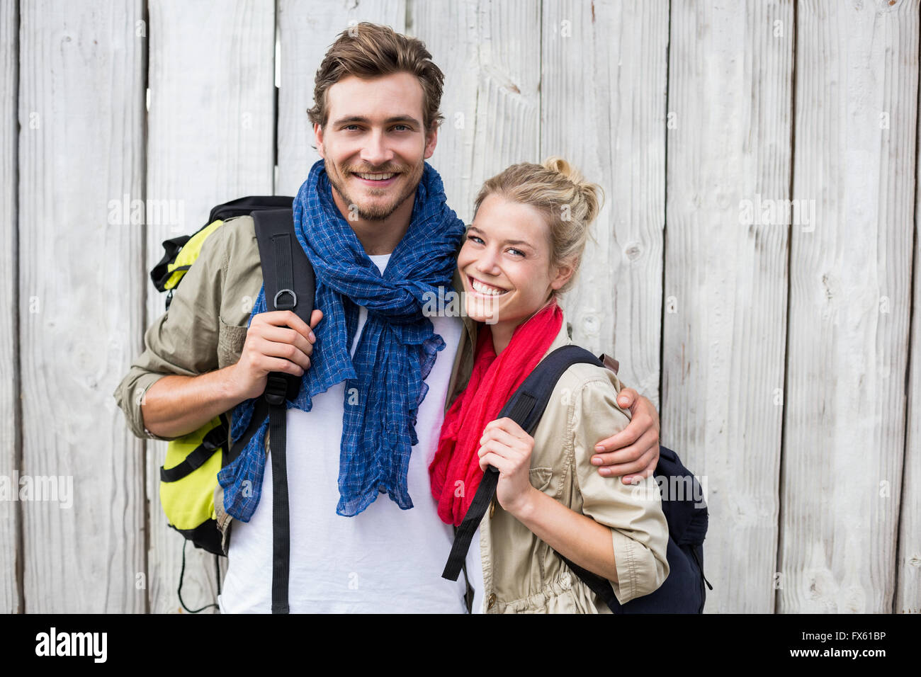 Young couple carrying rucksack Stock Photo - Alamy