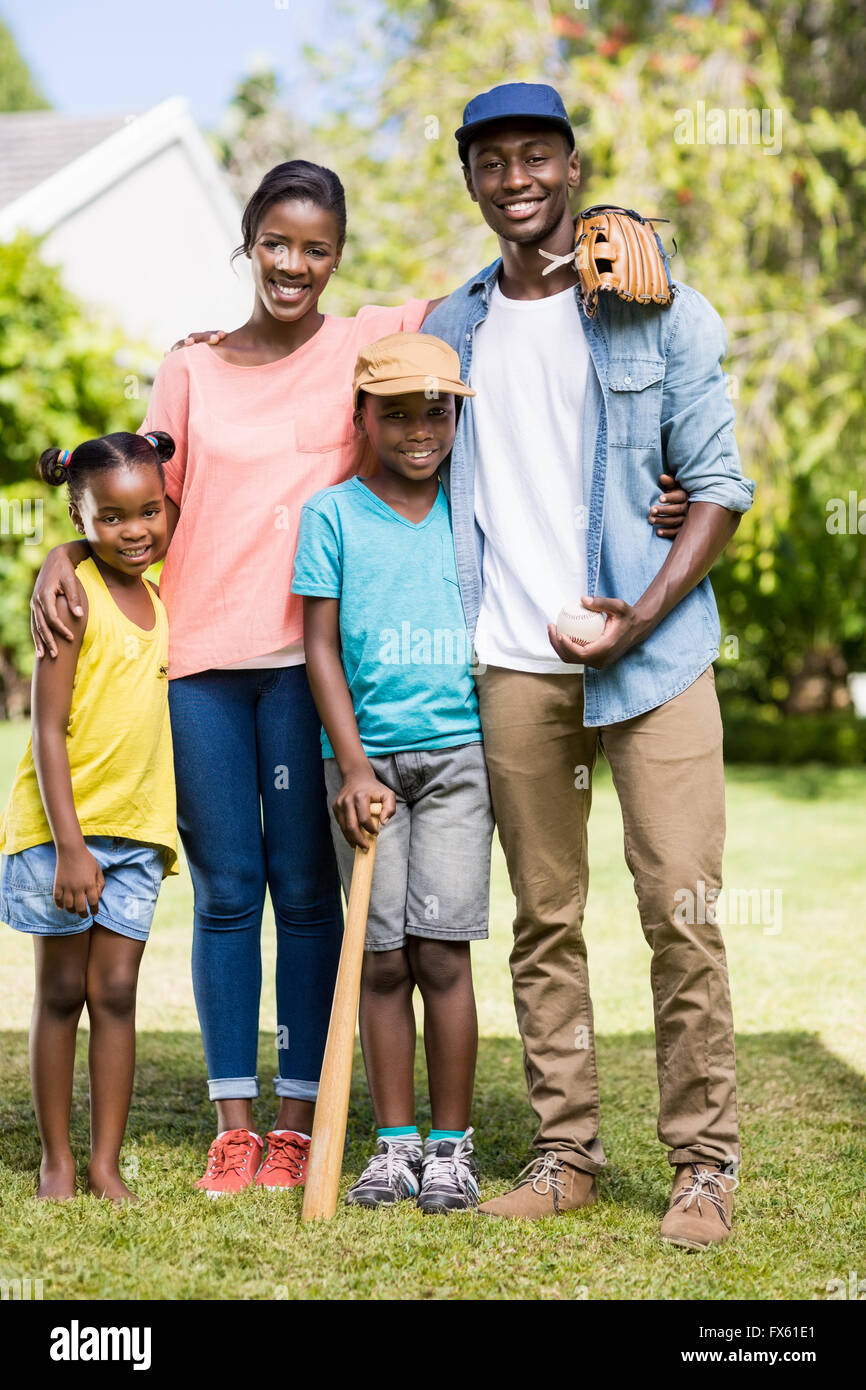 Happy family posing together Stock Photo - Alamy