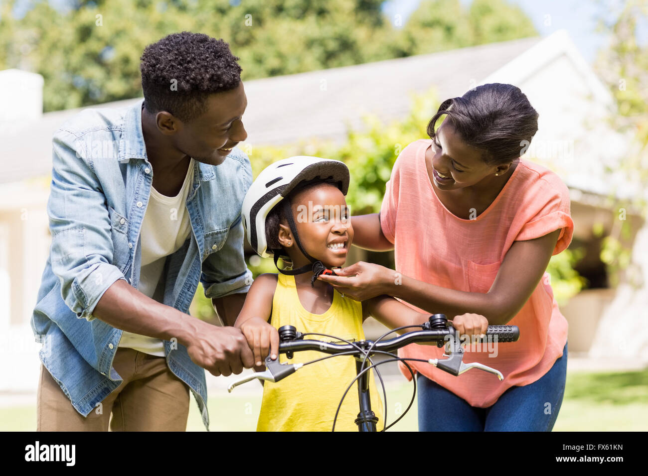 Happy family enjoying together Stock Photo - Alamy