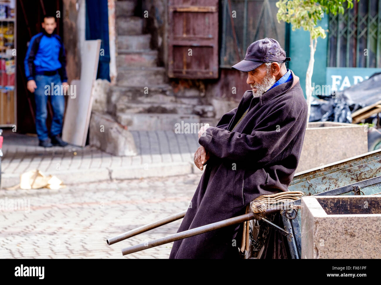 Old man resting marrakech morocco hi-res stock photography and images ...