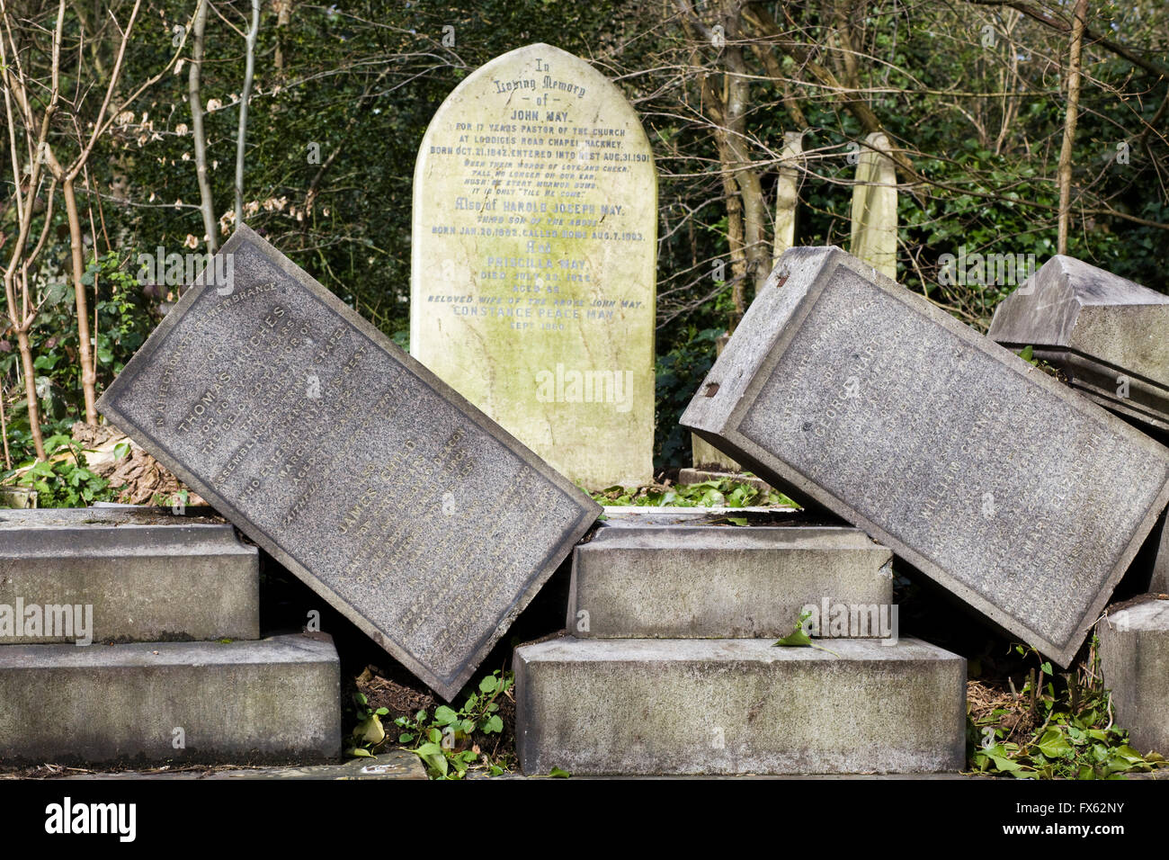 Damaged and fallen old graves and headstones in an Ancient Burial ...