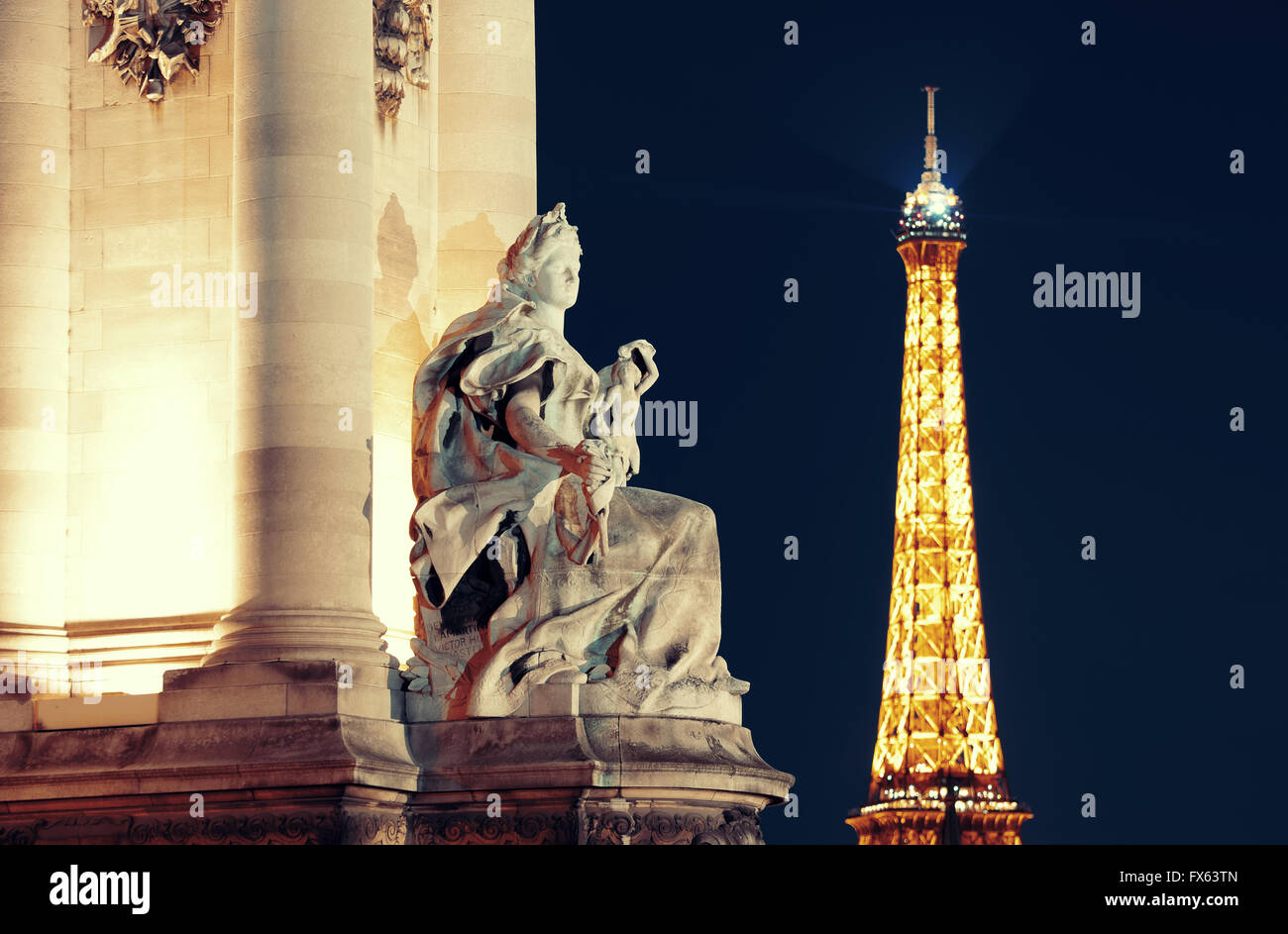 PARIS, FRANCE - MAY 13: Eiffel Tower and statue at night on May 13 ...