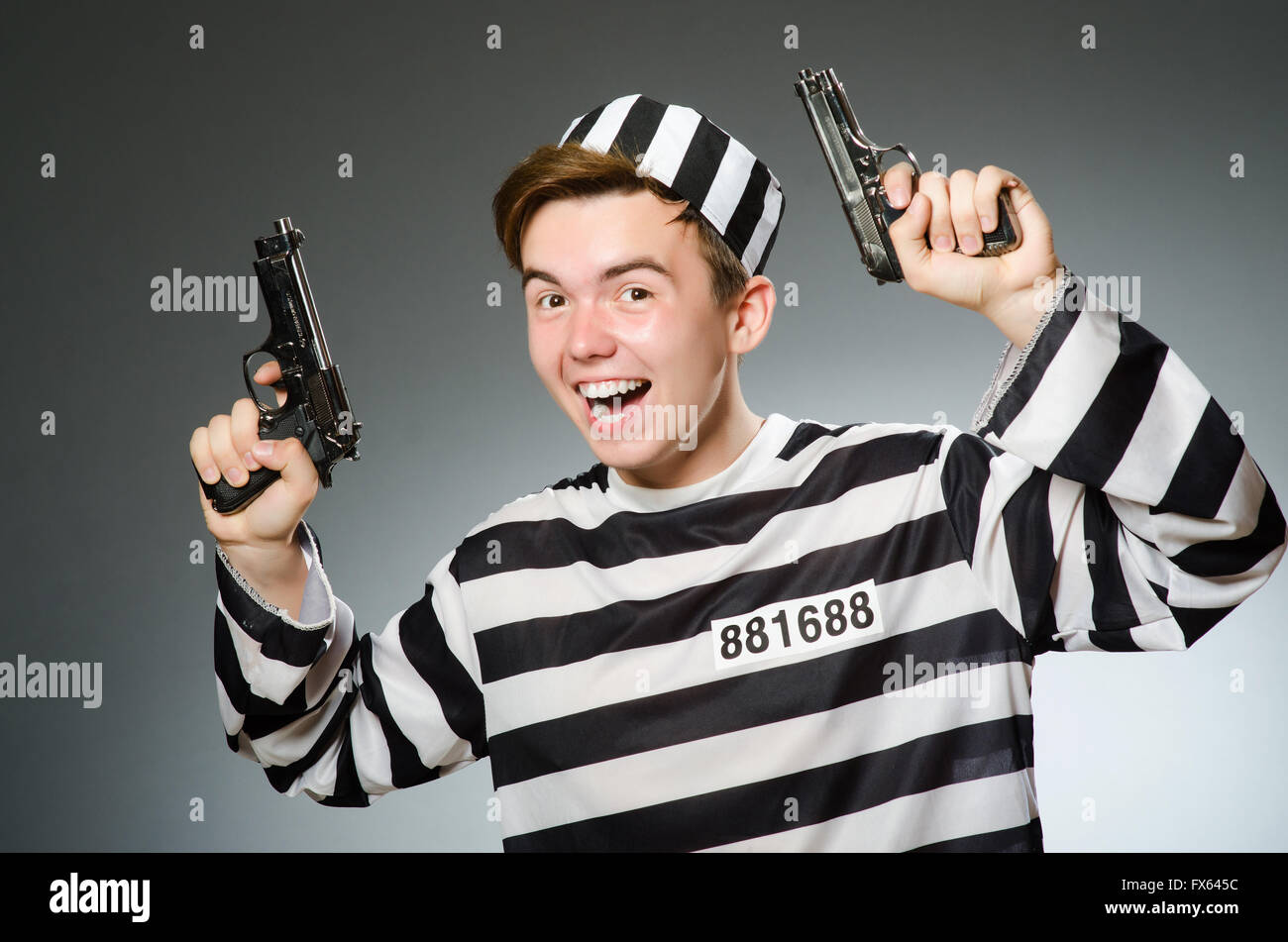 Funny prisoner in prison concept Stock Photo - Alamy