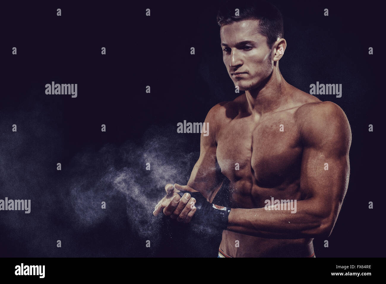 MMA Fighter Preparing Bandages For Training. Darck background Stock ...