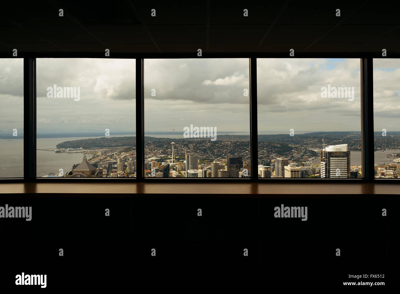 Seattle rooftop panorama view with urban architecture through window ...