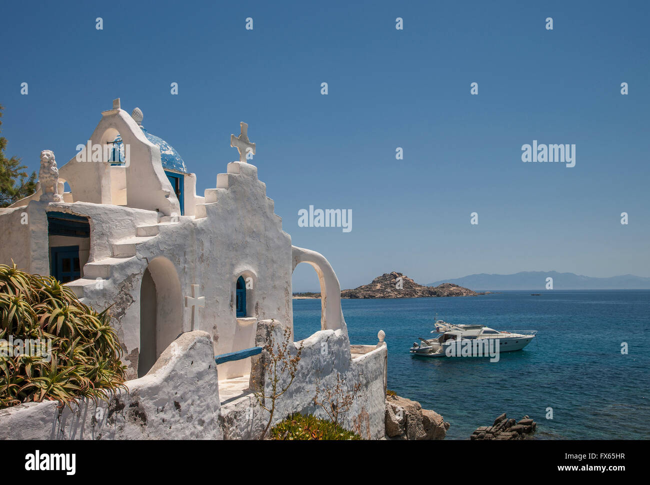 Traditional building on oceanside cliff Stock Photo - Alamy