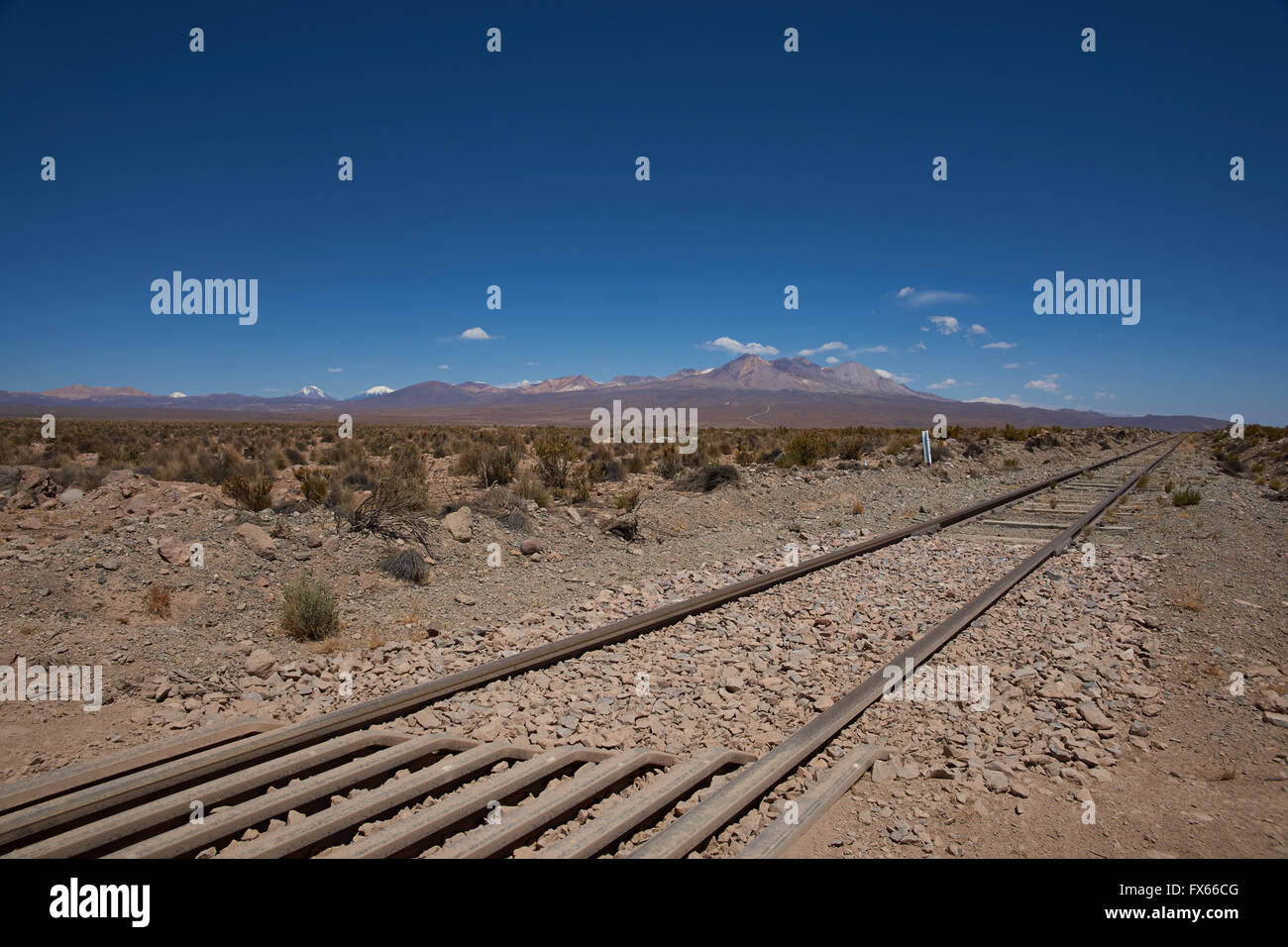 Railway line running across the Altiplano of northern Chile. The ...