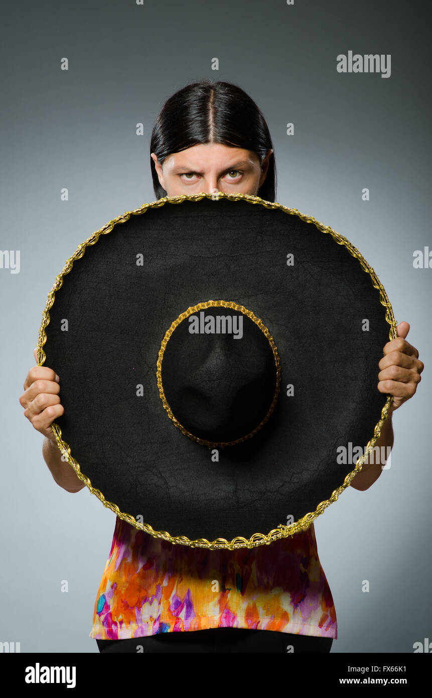 Young mexican man wearing sombrero Stock Photo - Alamy
