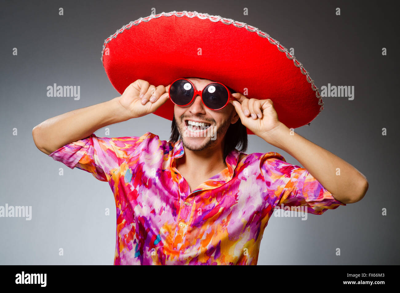 Young mexican man wearing sombrero Stock Photo - Alamy
