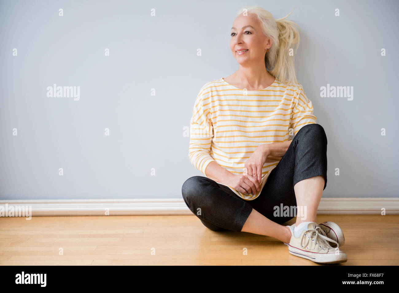 Adult female sitting front hi-res stock photography and images - Alamy