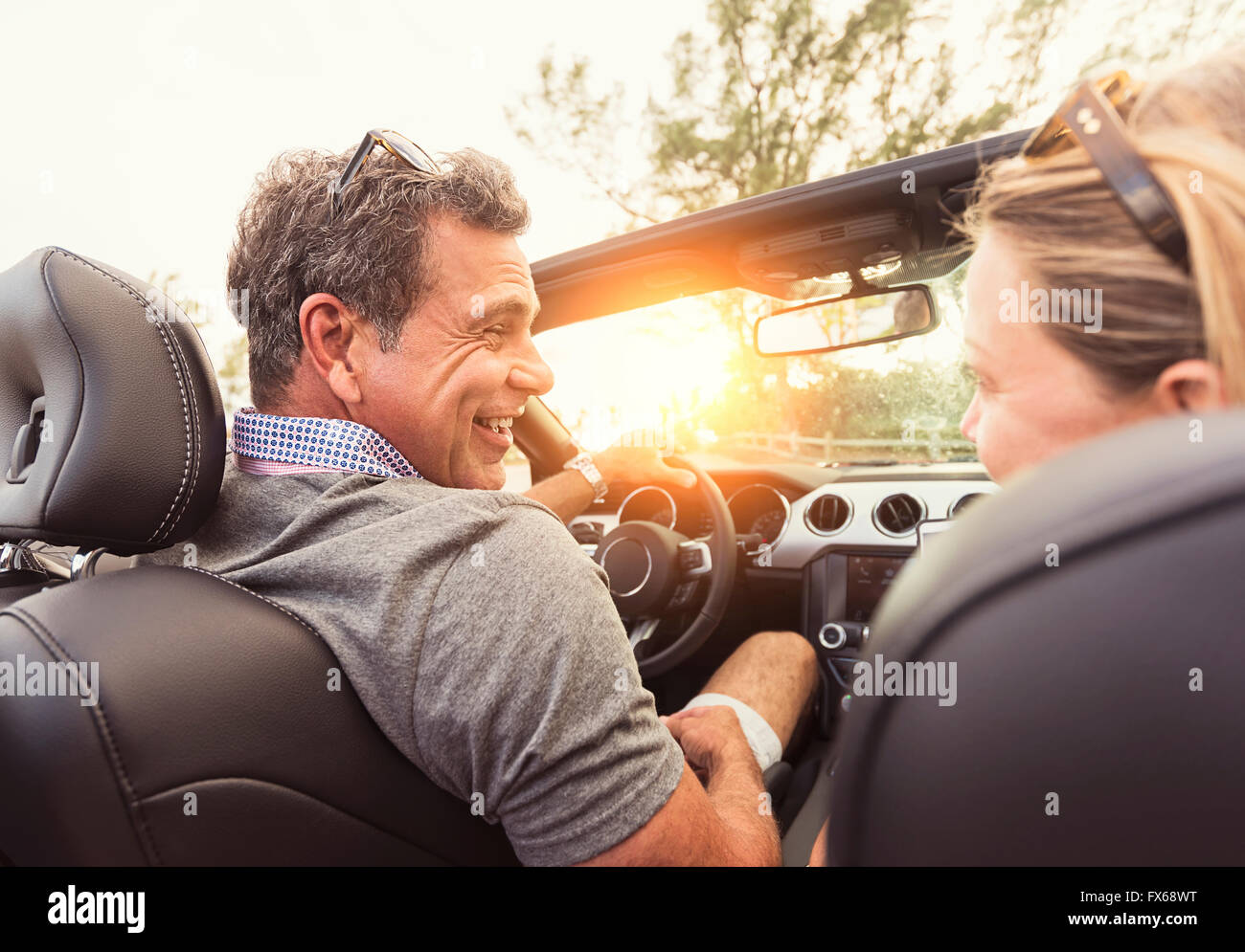 Car driving away sun hi-res stock photography and images - Alamy