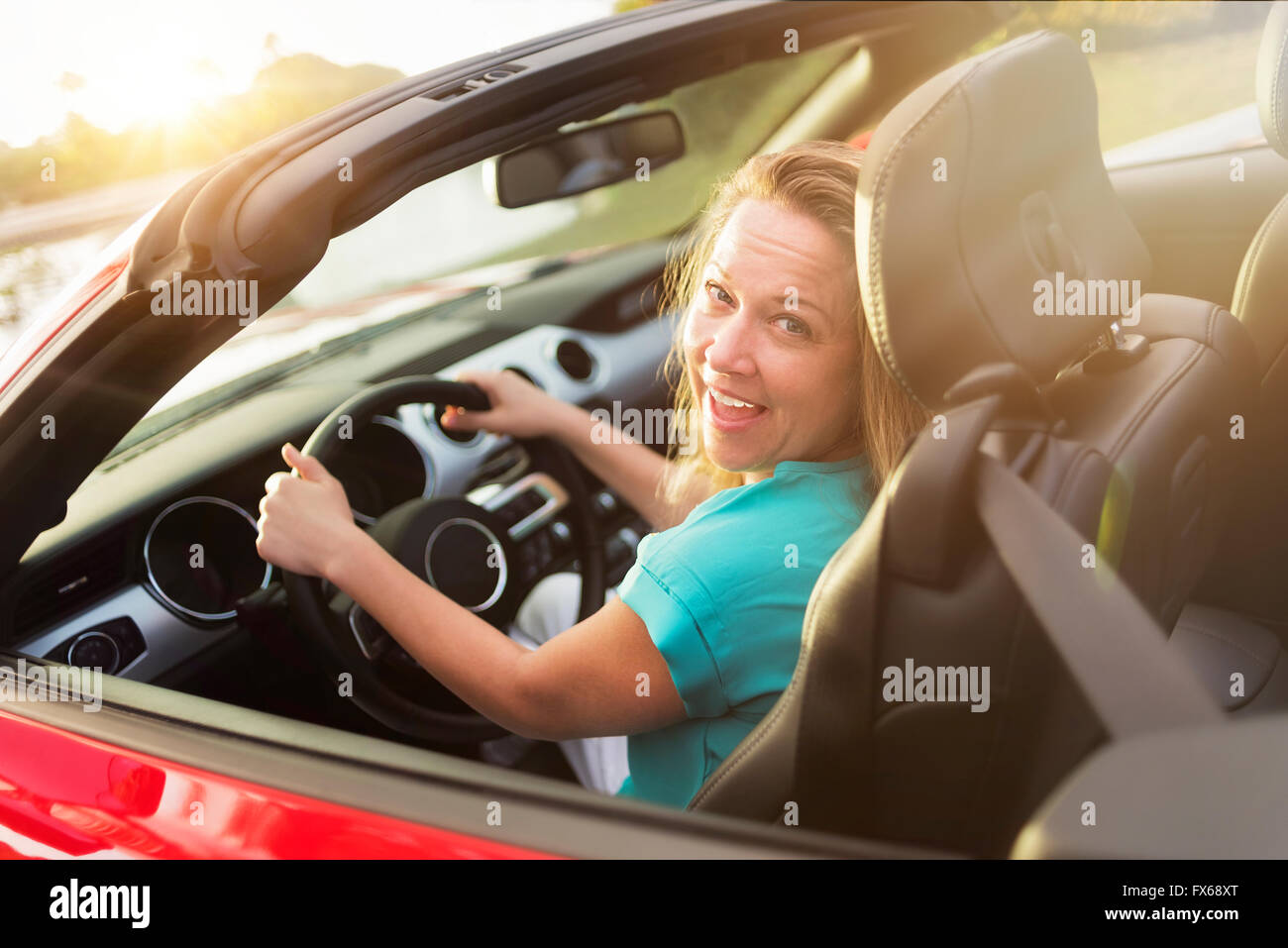 Women driving red convertible hi-res stock photography and images - Alamy