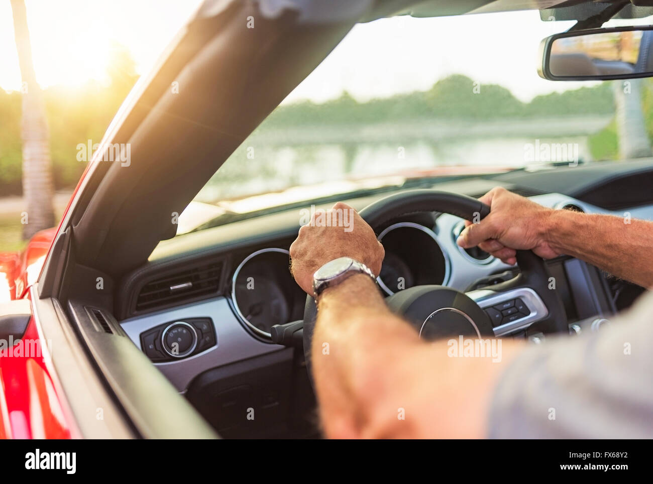 Caucasian man driving convertible Stock Photo - Alamy