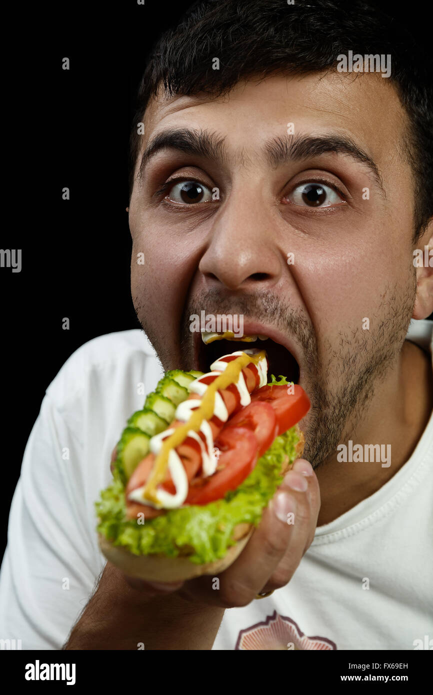 Fat Man Eating Chili Dogs