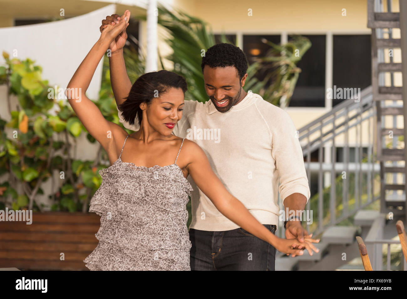 Couple dancing outdoors Stock Photo - Alamy