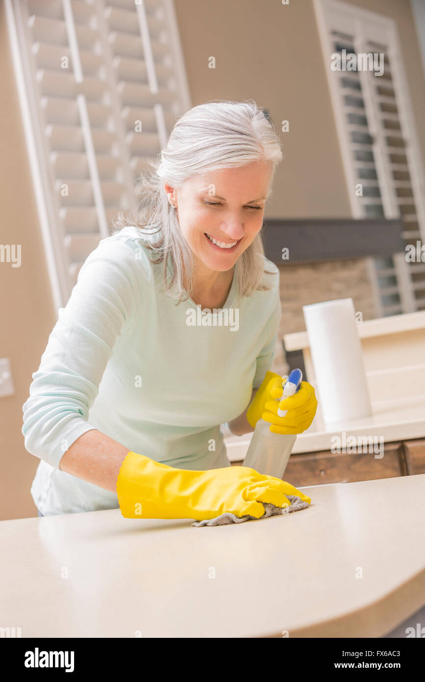 Mature cleaning lady hi-res stock photography and images - Alamy