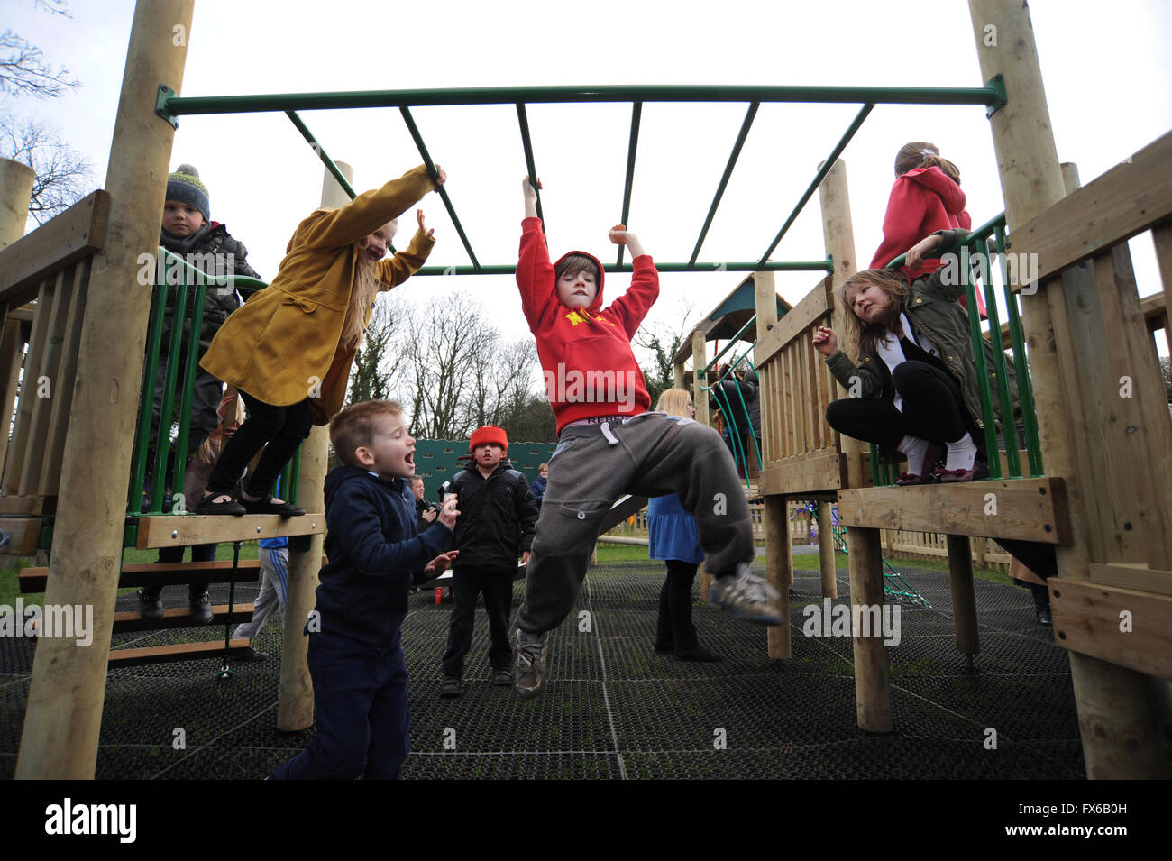 Children enjoy playing in a playground Stock Photo - Alamy