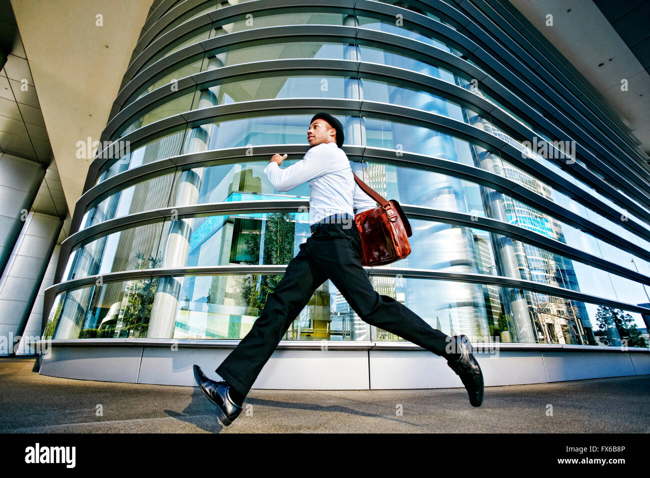 Hurrying into office building hi-res stock photography and images - Alamy