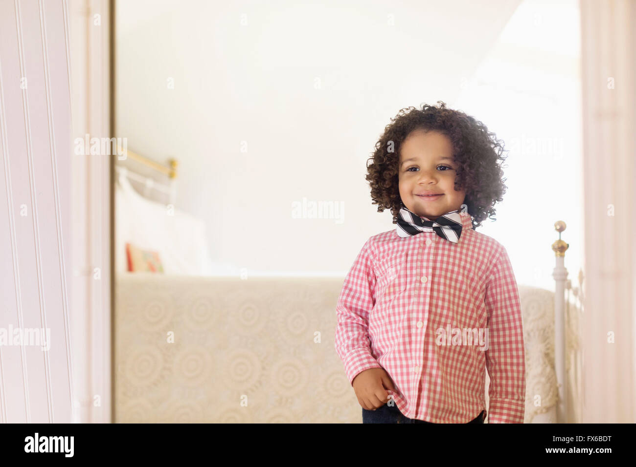 Boy with bow hi-res stock photography and images - Alamy