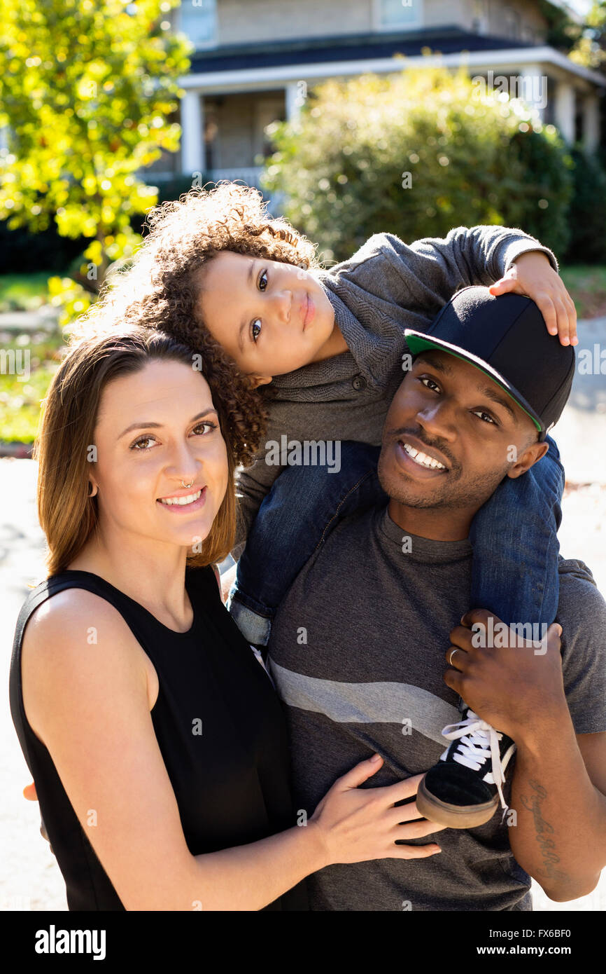 Family smiling outdoors Stock Photo - Alamy