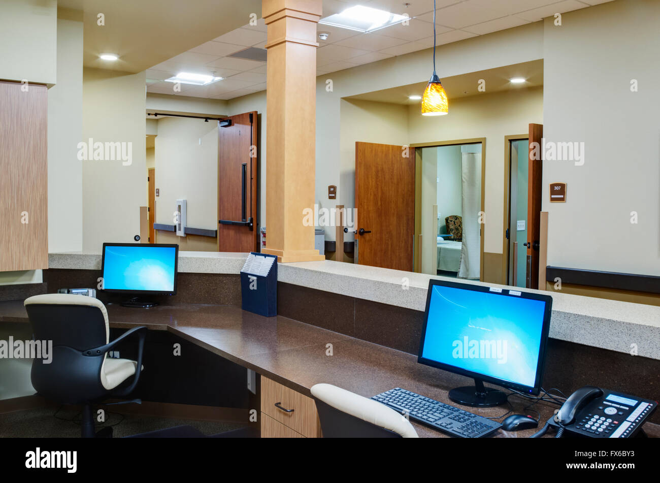 Empty receptionist desk in assisted living facility Stock Photo - Alamy