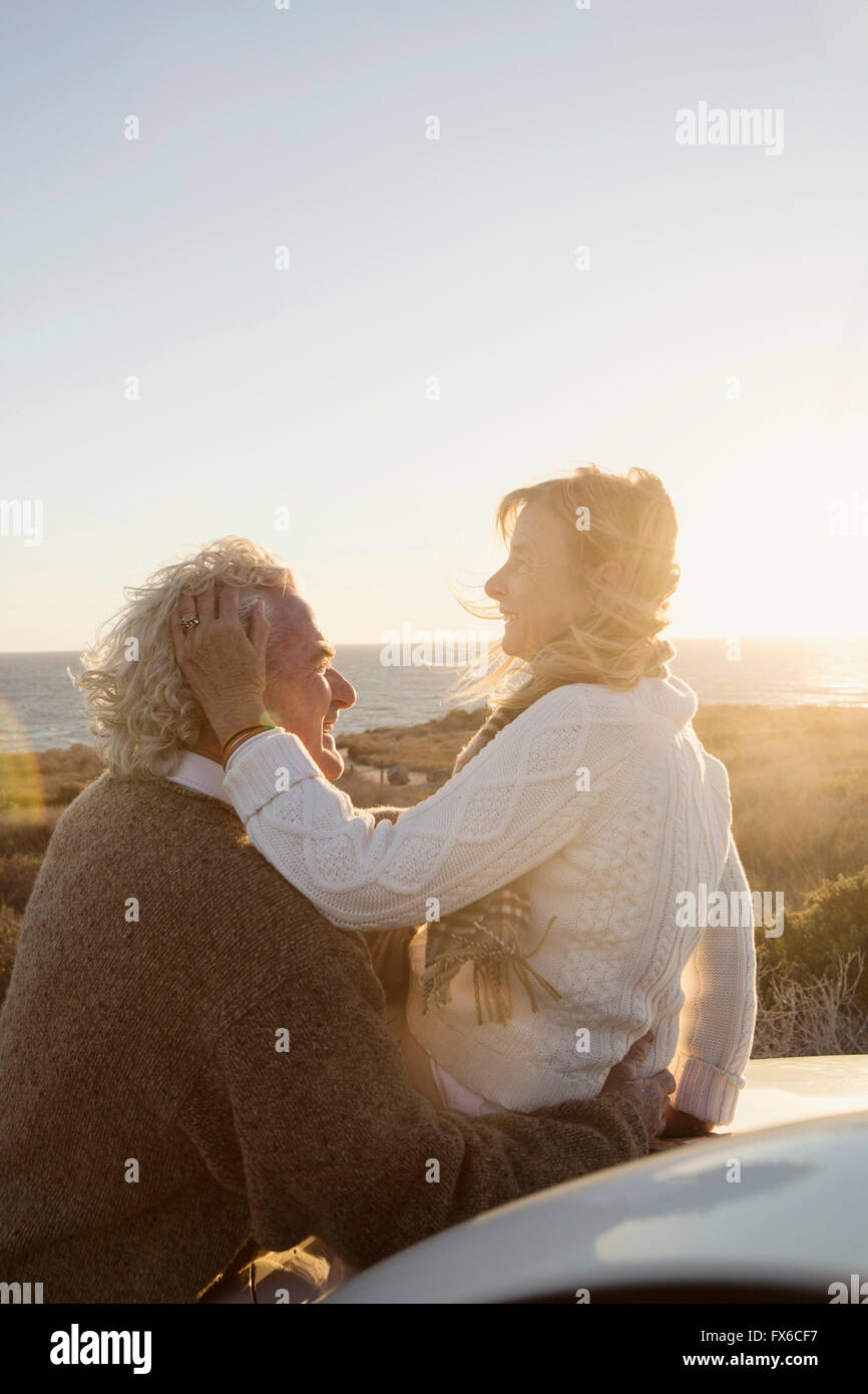 Older Caucasian couple hugging outdoors Stock Photo - Alamy